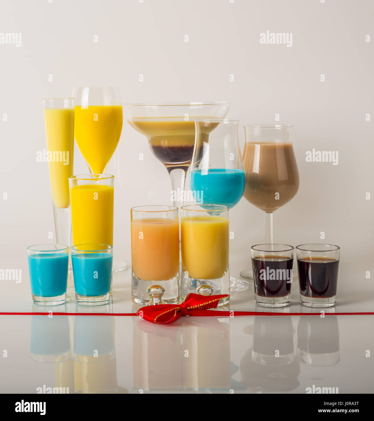 Colorful drinks based on milk liqueurs, unique pastel colors of drinks ...