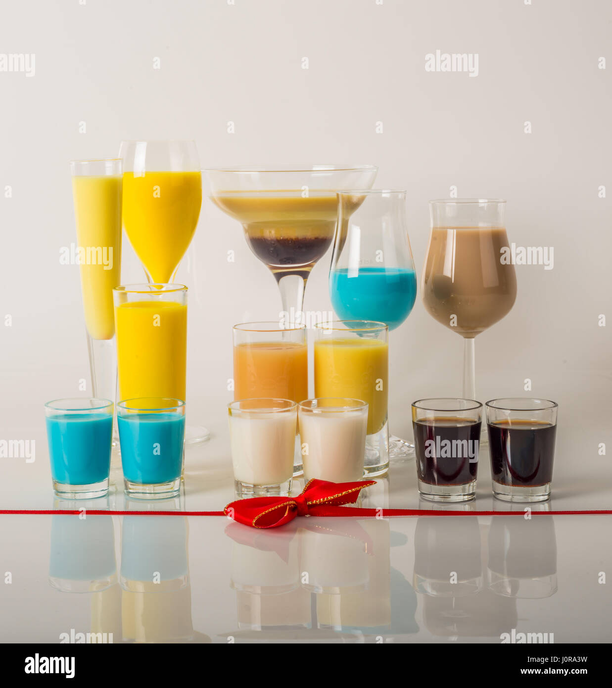 Colorful drinks based on milk liqueurs, unique pastel colors of drinks ...