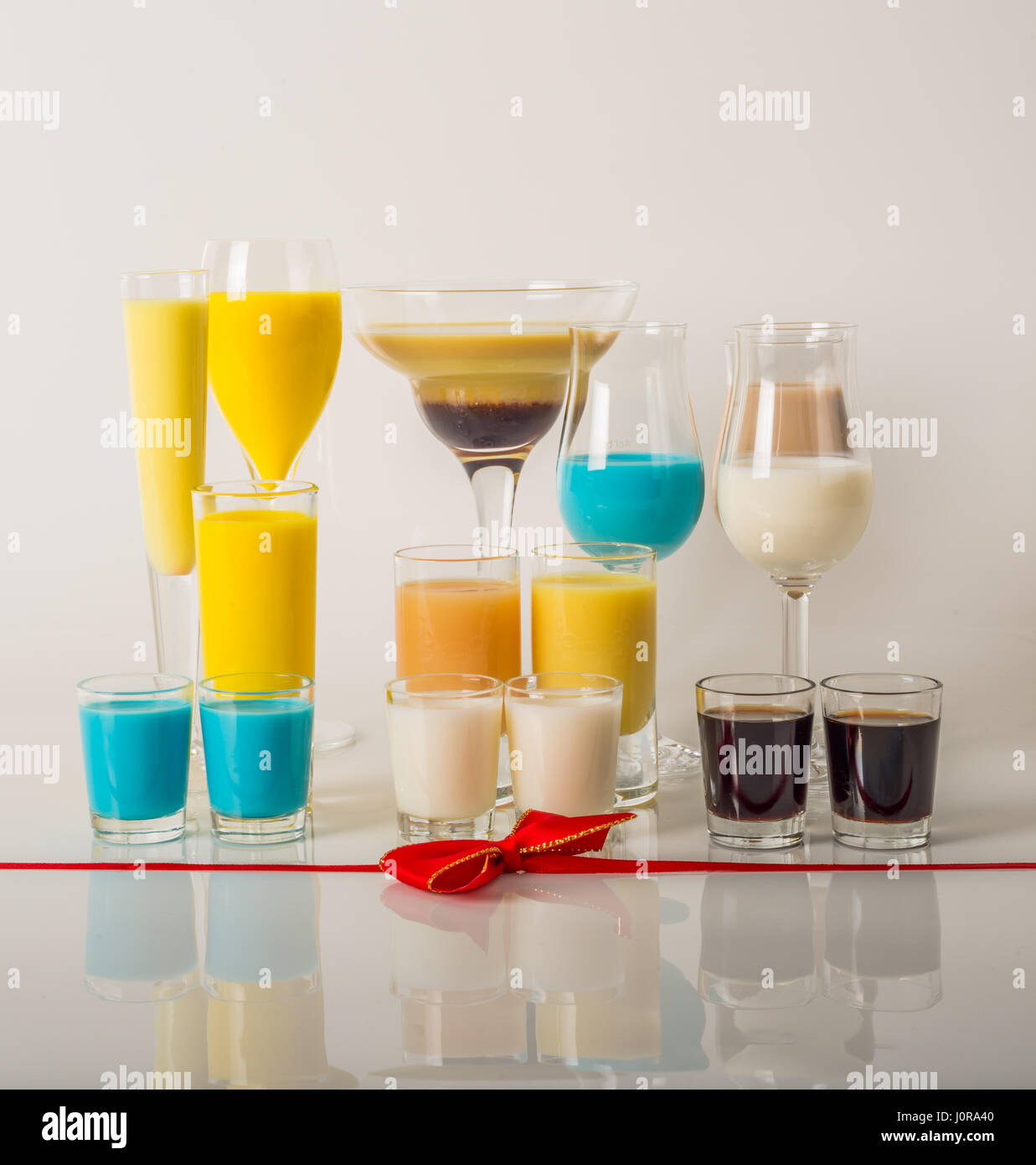 Colorful drinks based on milk liqueurs, unique pastel colors of drinks ...