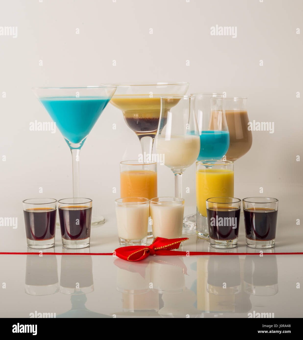 Colorful drinks based on milk liqueurs, unique pastel colors of drinks ...