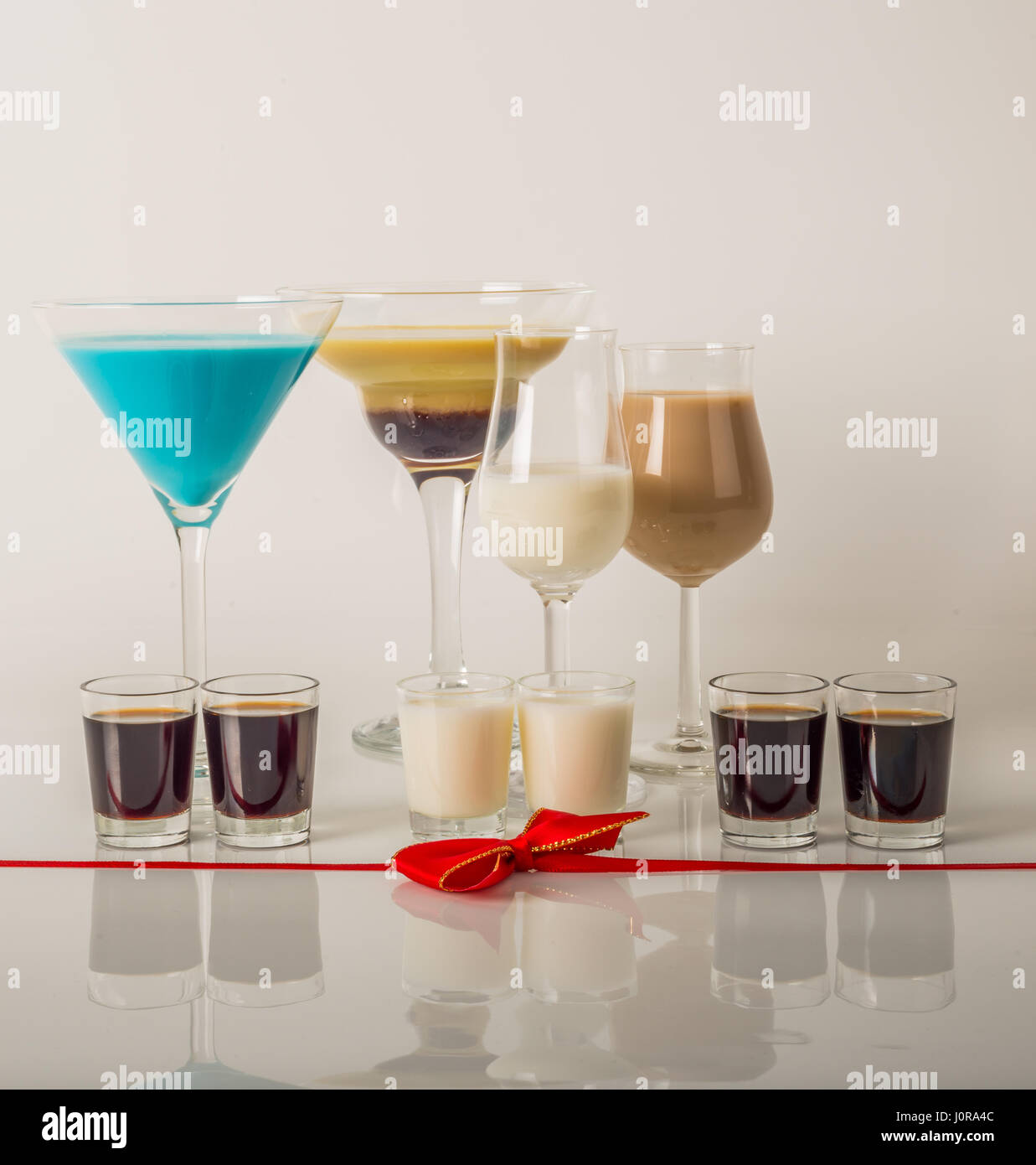 Colorful drinks based on milk liqueurs, unique pastel colors of drinks ...