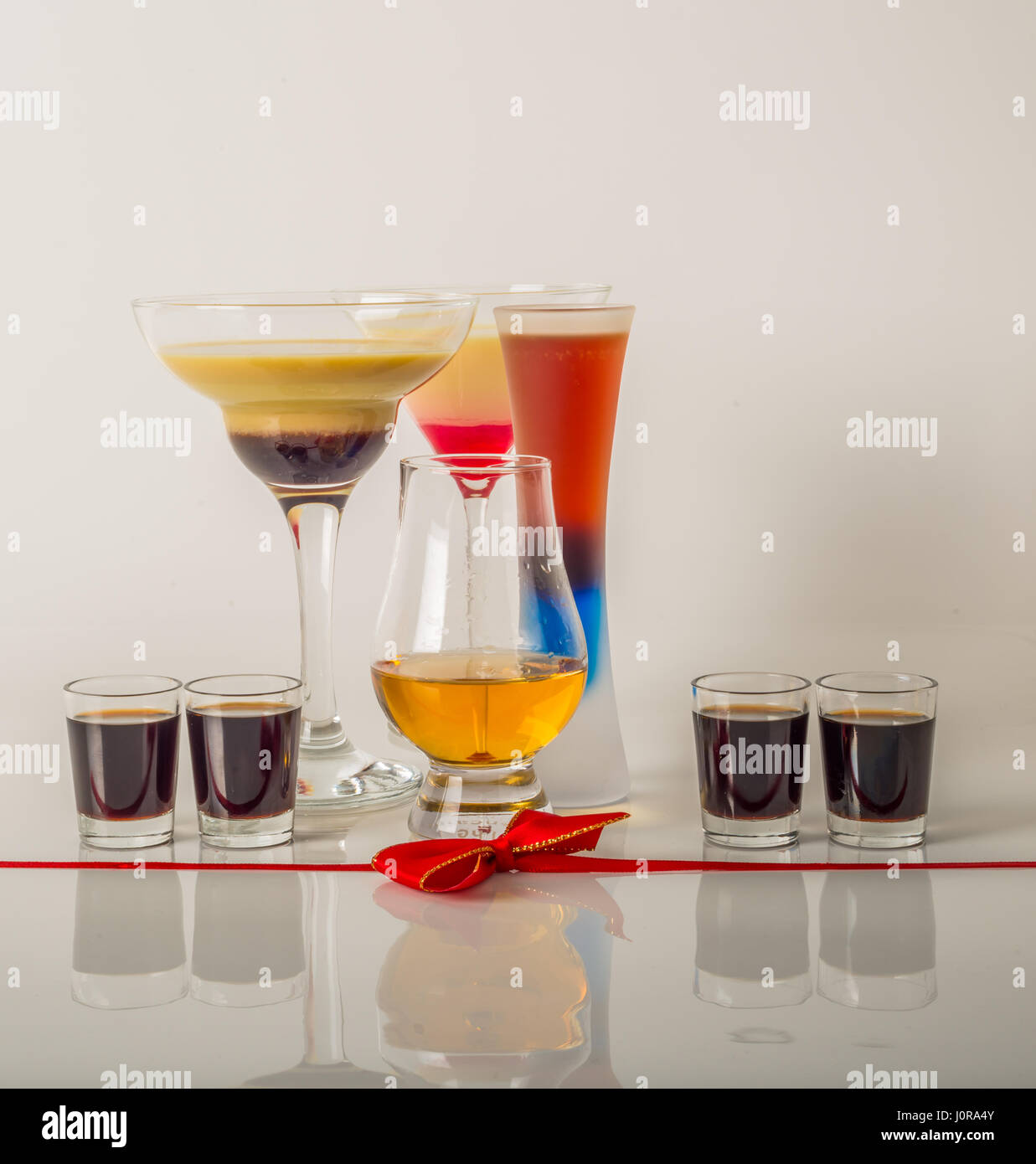 Colorful drinks based on milk liqueurs, unique pastel colors of drinks ...