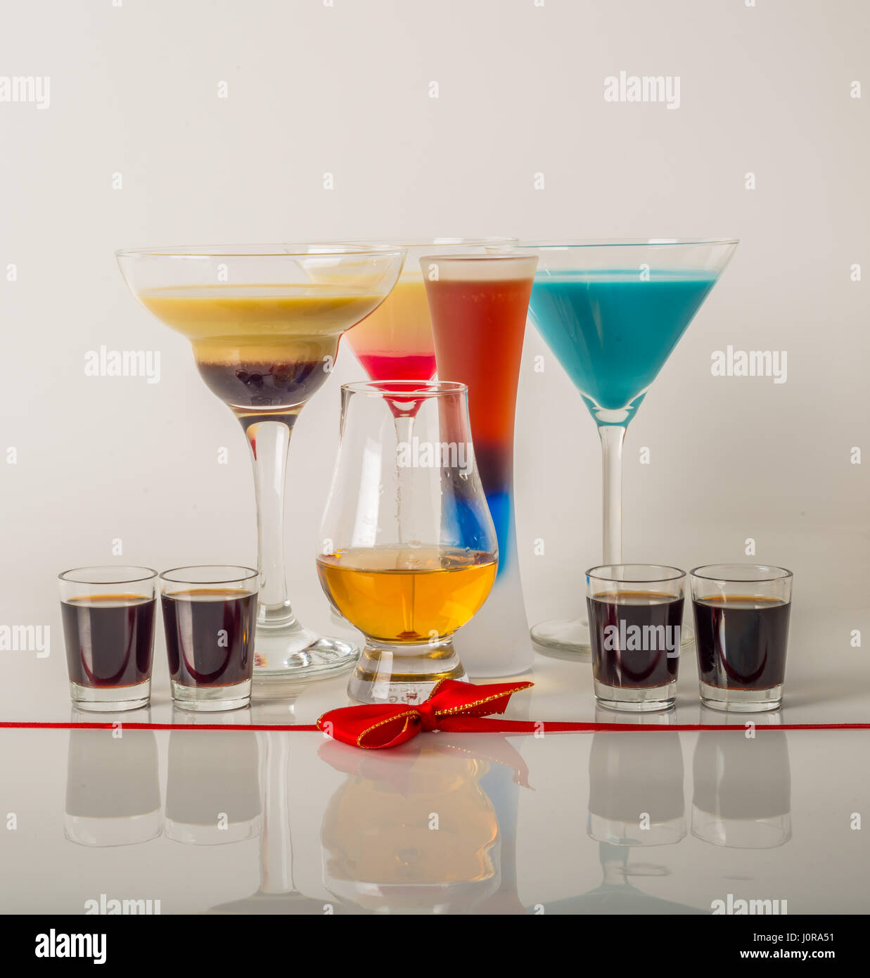 Colorful drinks based on milk liqueurs, unique pastel colors of drinks ...