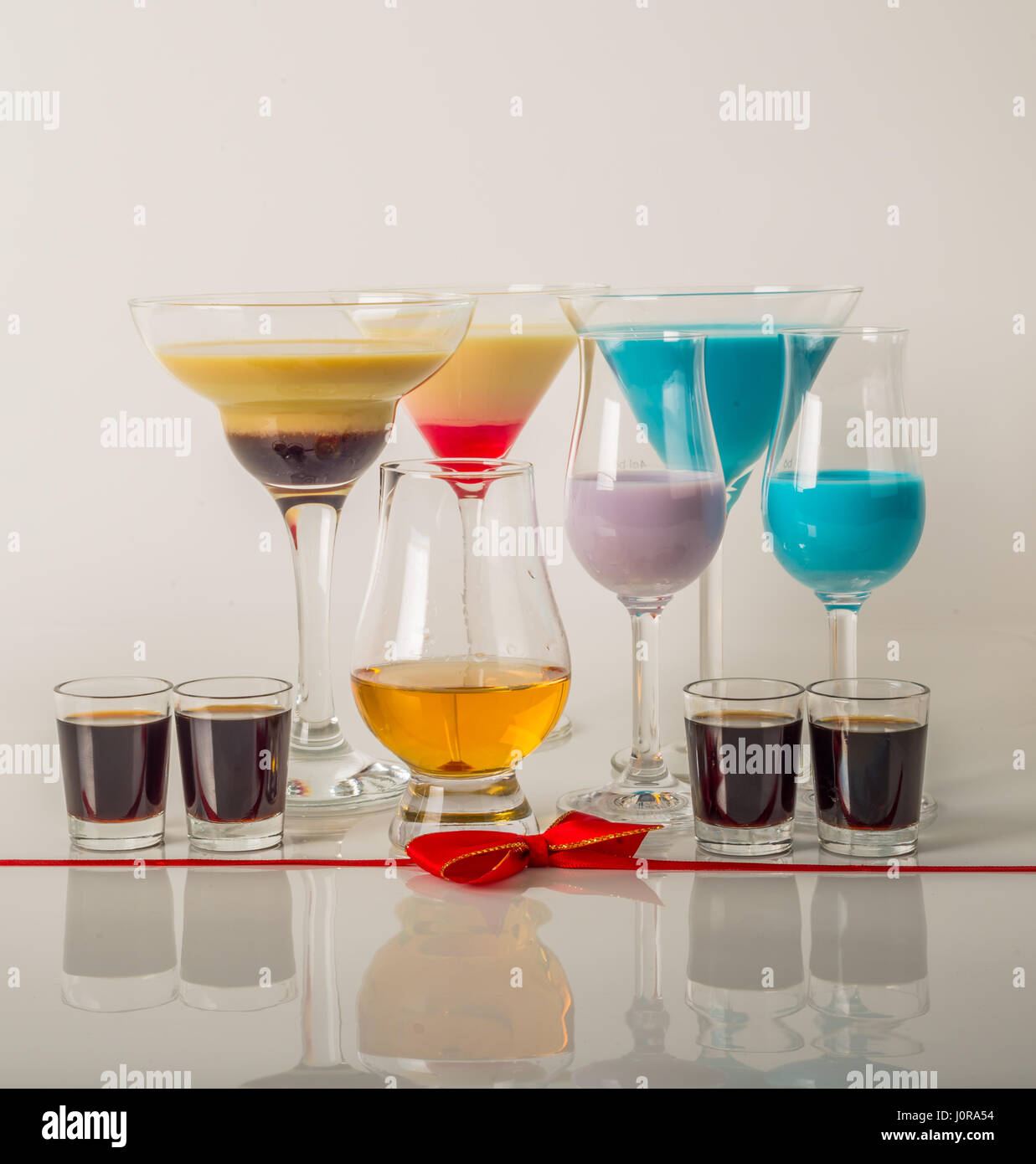 Colorful drinks based on milk liqueurs, unique pastel colors of drinks ...