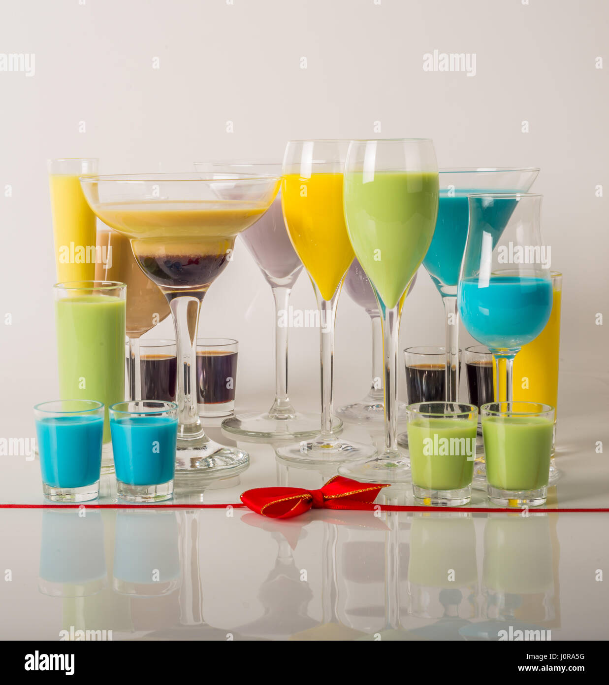 Colorful drinks based on milk liqueurs, unique pastel colors of drinks ...