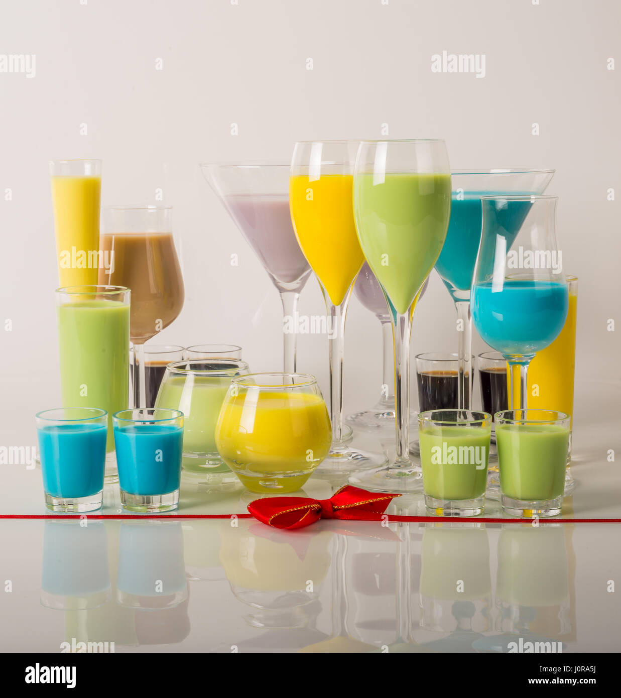 Colorful drinks based on milk liqueurs, unique pastel colors of drinks ...