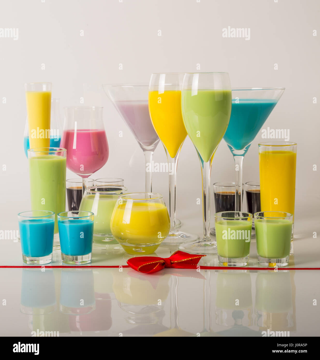 Colorful drinks based on milk liqueurs, unique pastel colors of drinks ...