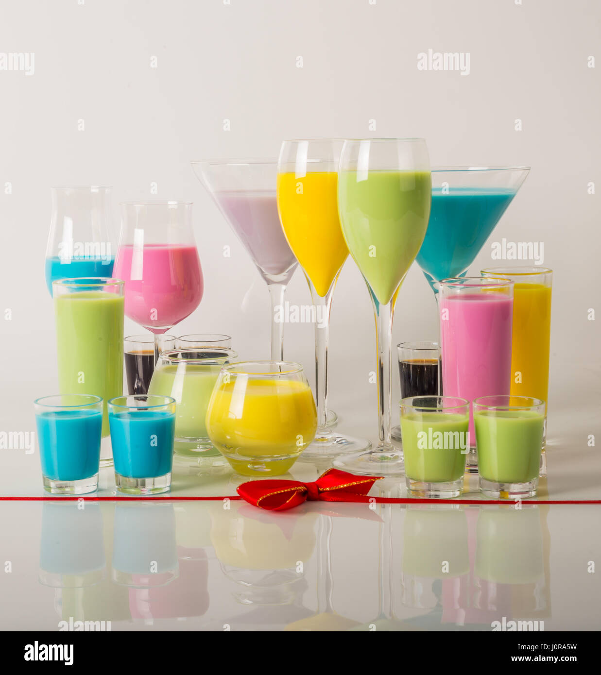 Colorful drinks based on milk liqueurs, unique pastel colors of drinks ...