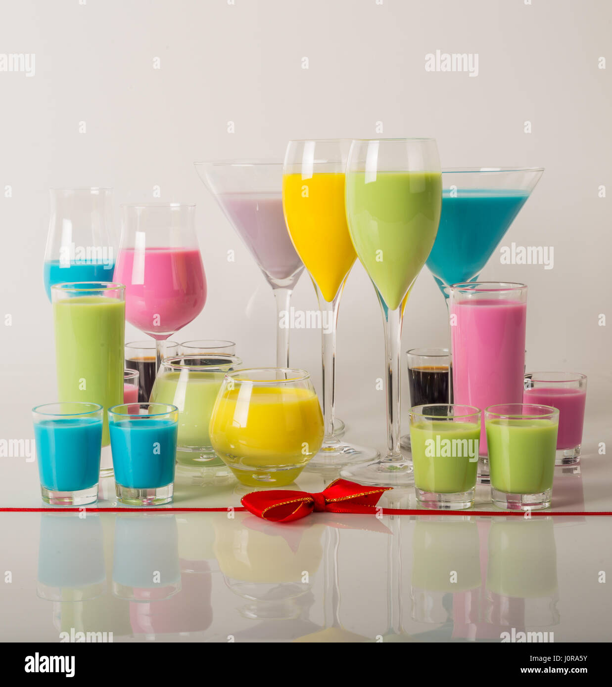 Colorful drinks based on milk liqueurs, unique pastel colors of drinks ...