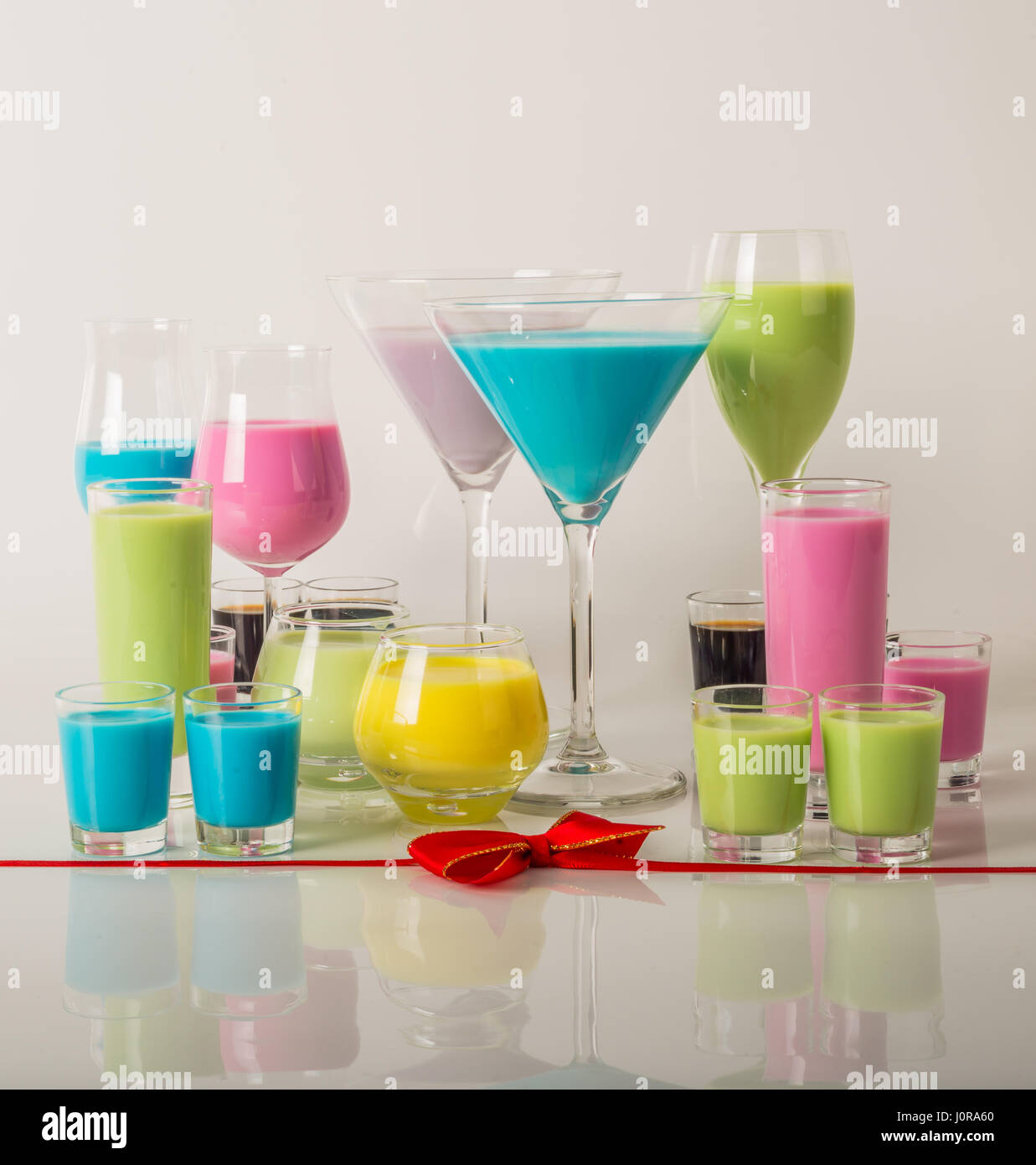 Colorful drinks based on milk liqueurs, unique pastel colors of drinks ...