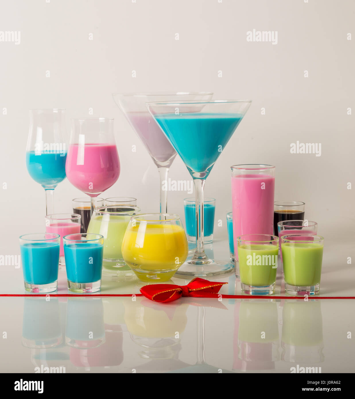 Colorful drinks based on milk liqueurs, unique pastel colors of drinks ...
