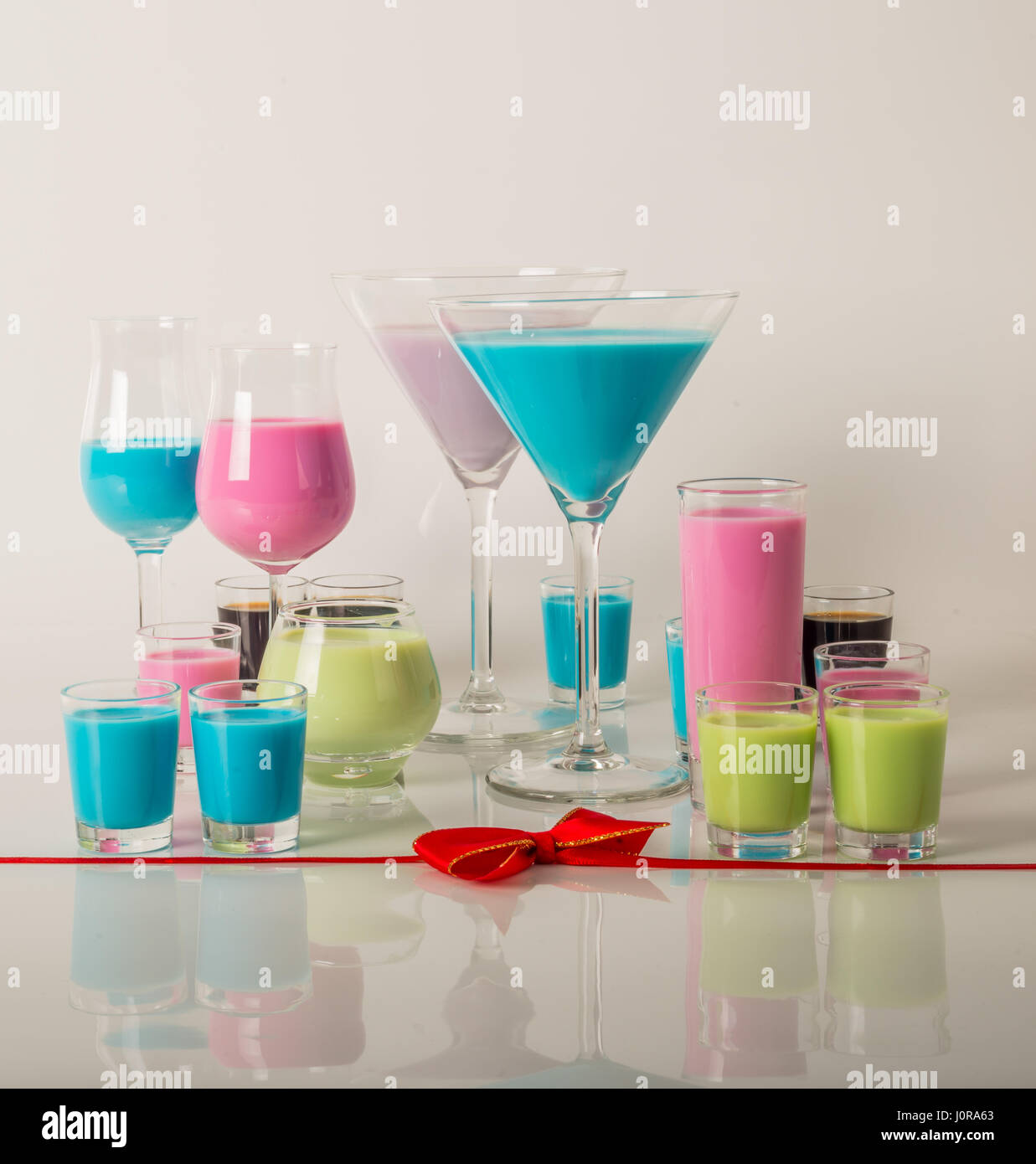 Colorful drinks based on milk liqueurs, unique pastel colors of drinks ...