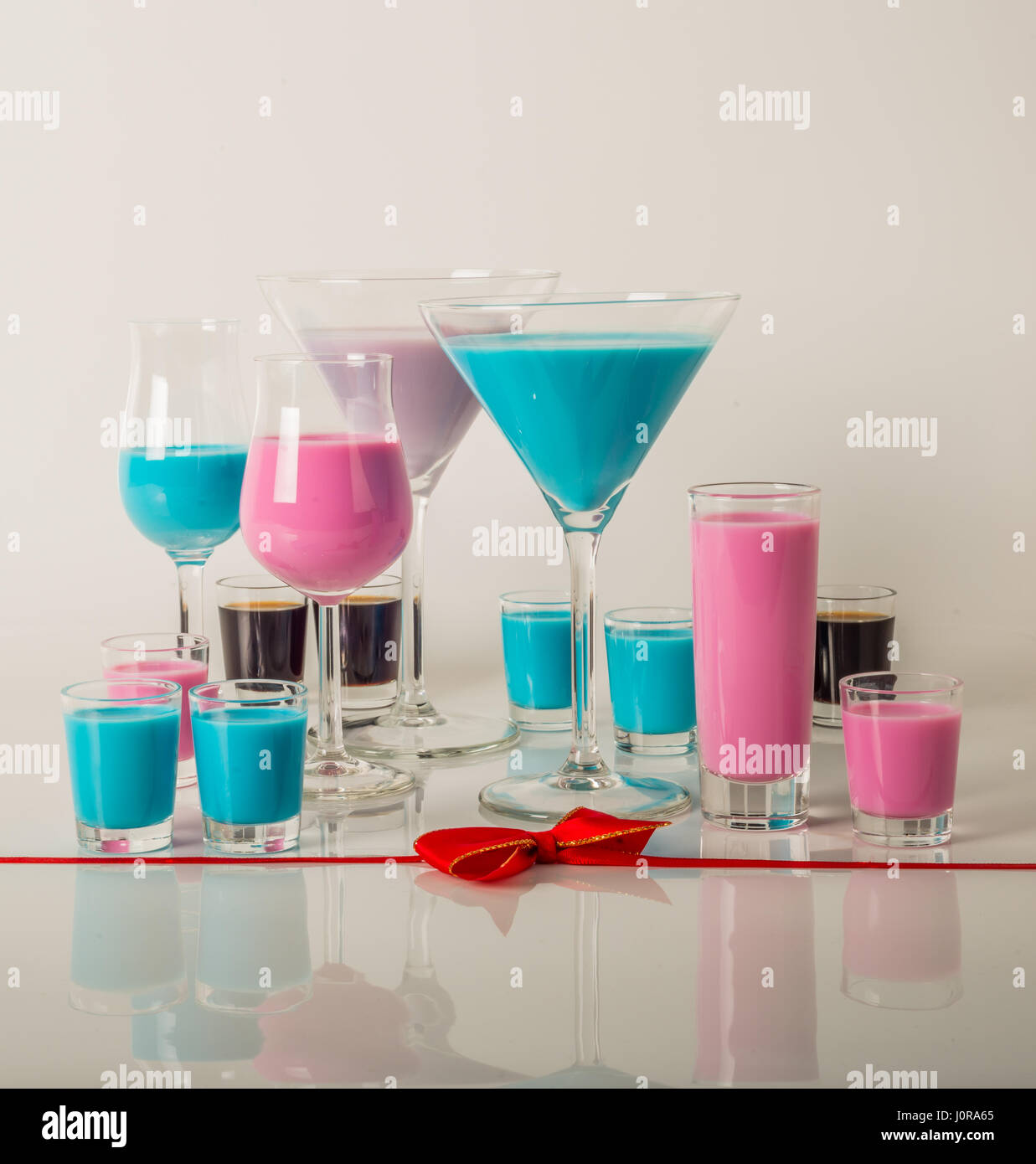 Colorful drinks based on milk liqueurs, unique pastel colors of drinks ...