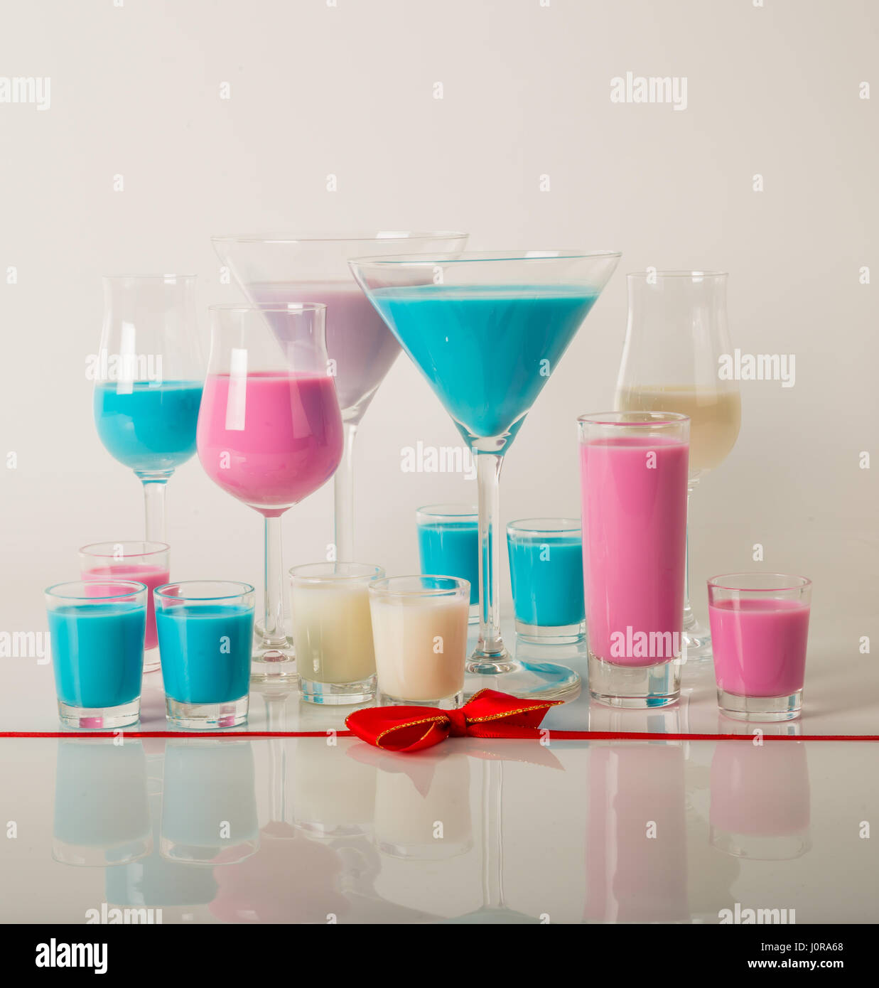 Colorful drinks based on milk liqueurs, unique pastel colors of drinks ...