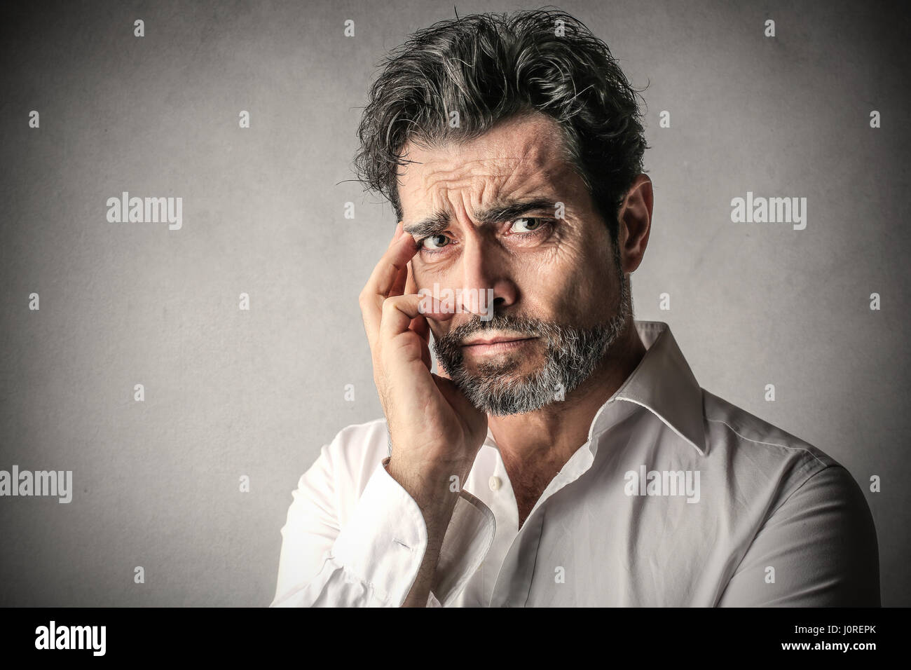 Man being worried Stock Photo - Alamy
