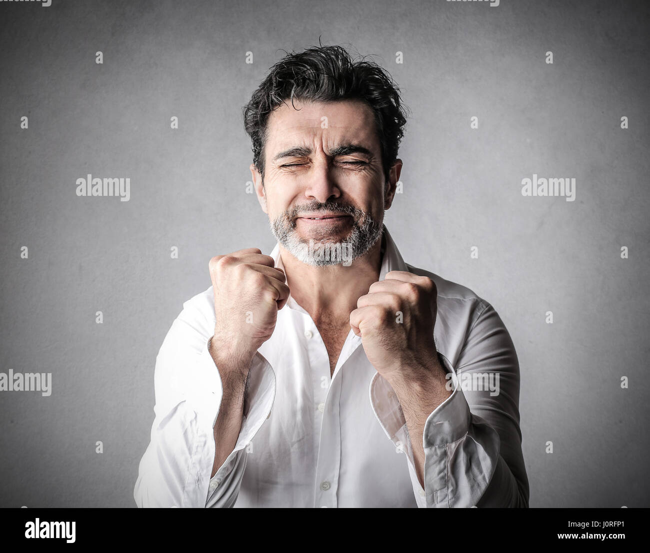 Man feeling victorious Stock Photo - Alamy