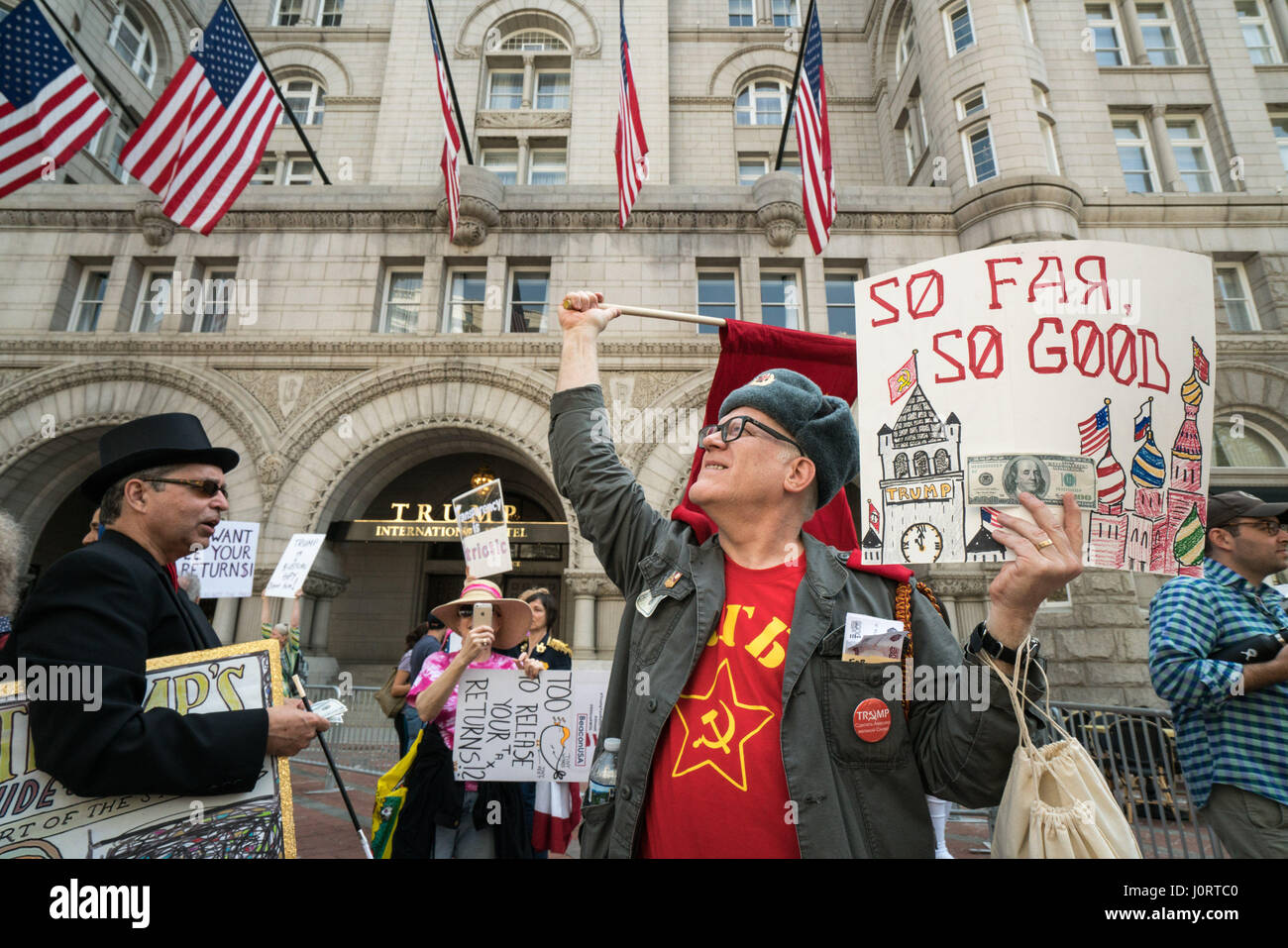Washington, District of Columbia, USA. 15th Apr, 2017. A protestor ...