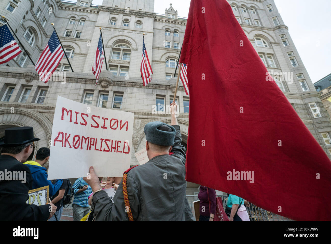 Washington, District of Columbia, USA. 15th Apr, 2017. A protestor ...