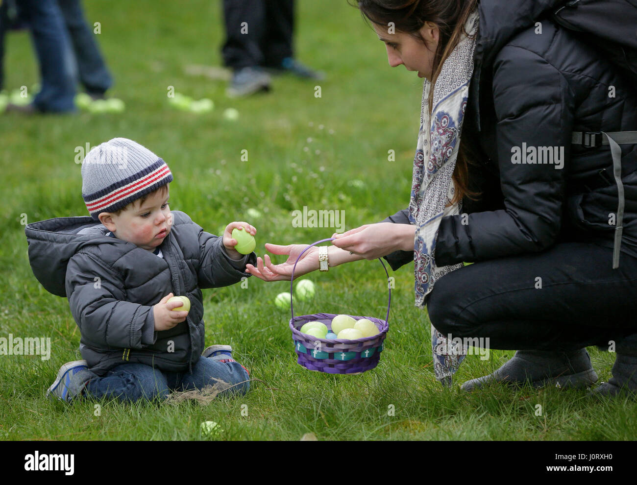 Vancouver, Canada. 15th Apr, 2017. A boy looks for eggs during the ...