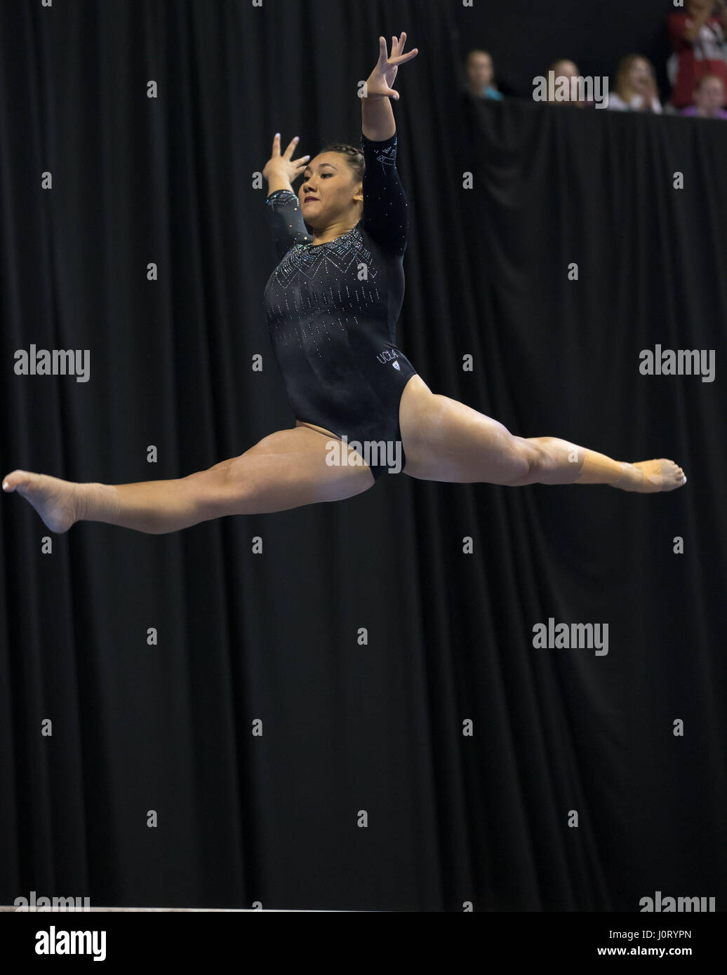 St. 15th Apr, 2017. UCLA's Kyle Ross does a split in the air while on ...