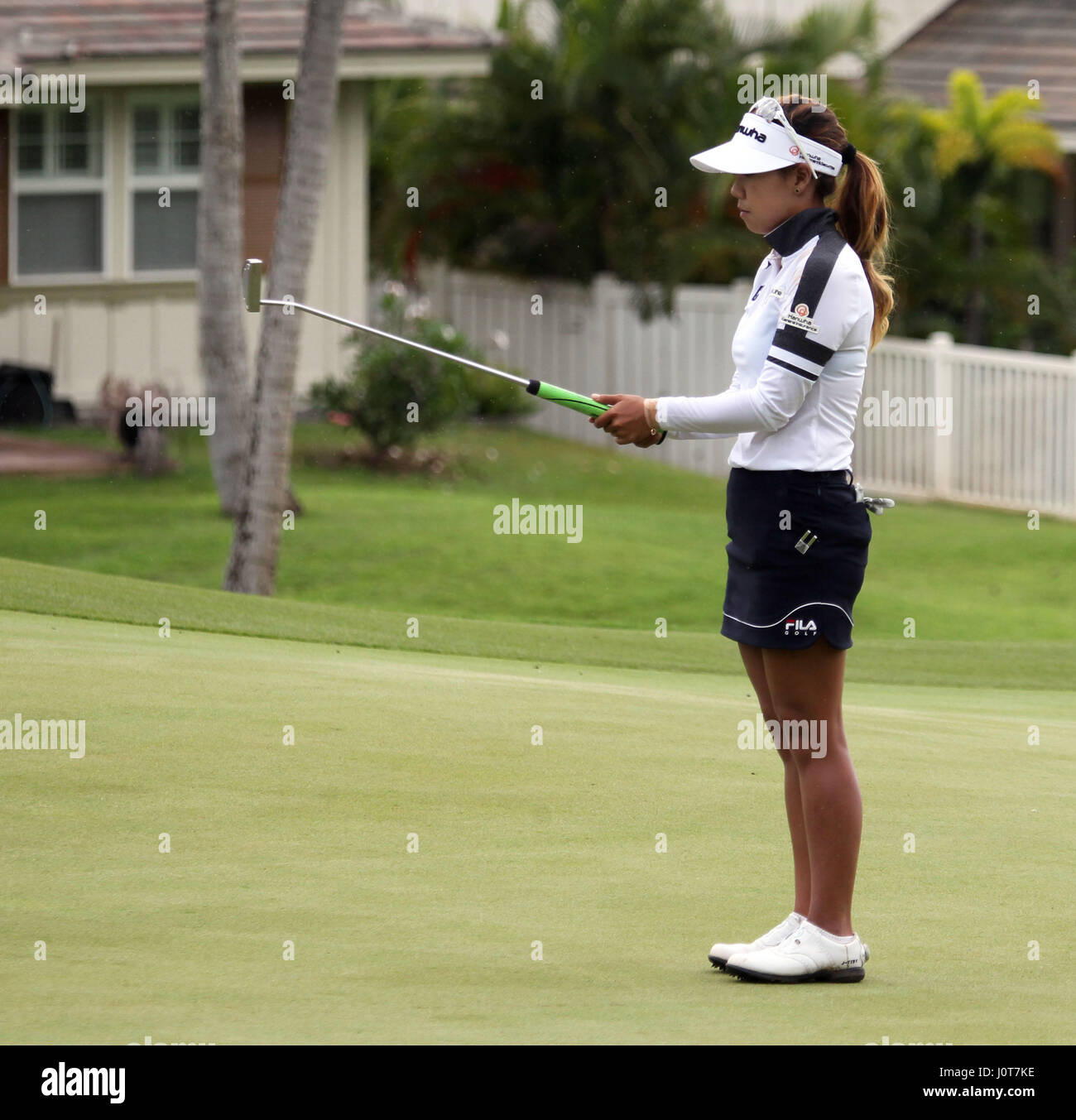 April 15, 2017 - Jenny Shin lines up a putt on the 14th hole during ...