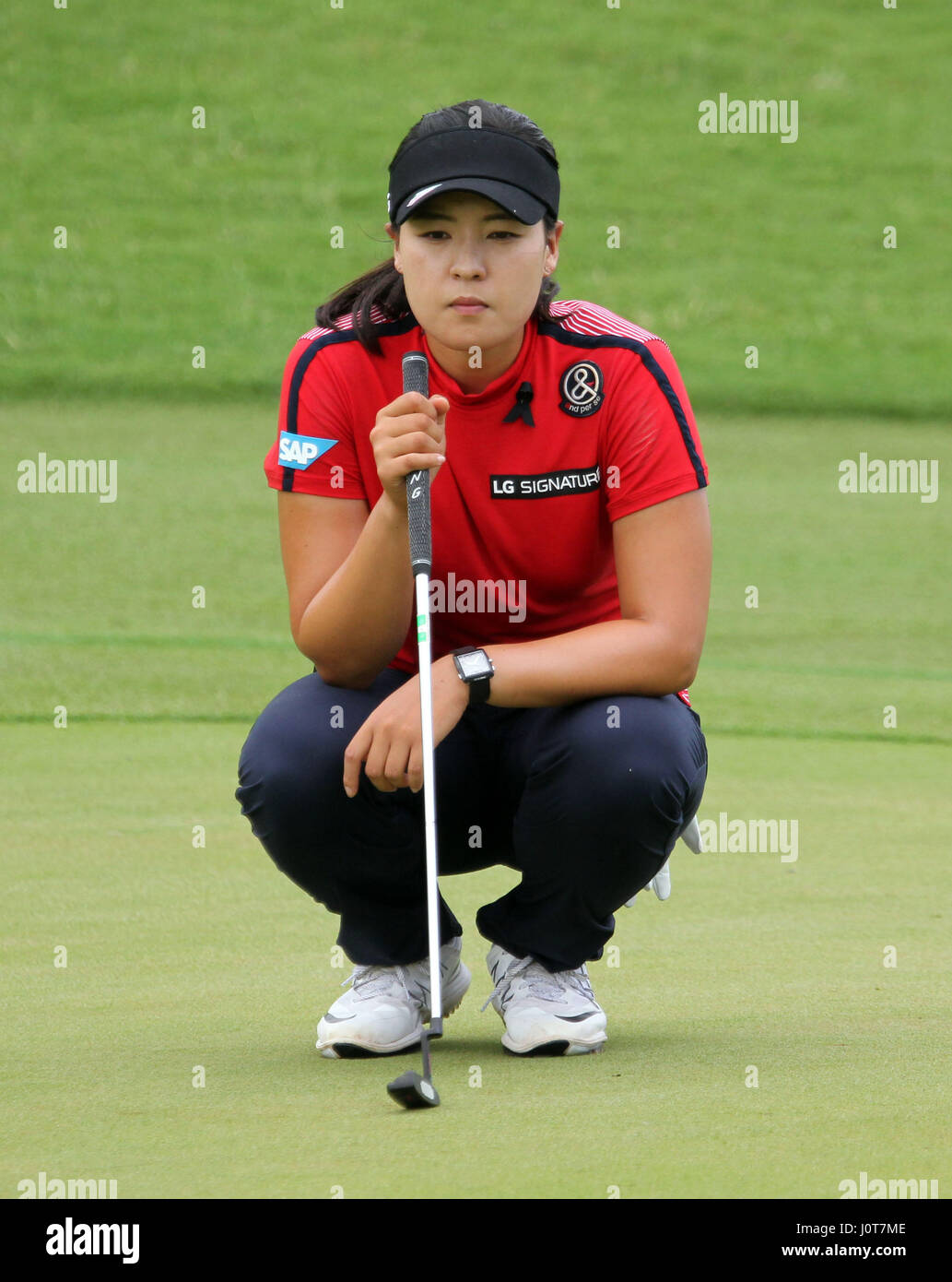 April 15, 2017 - In Gee Chun lines up her putt on the 13th hole during ...
