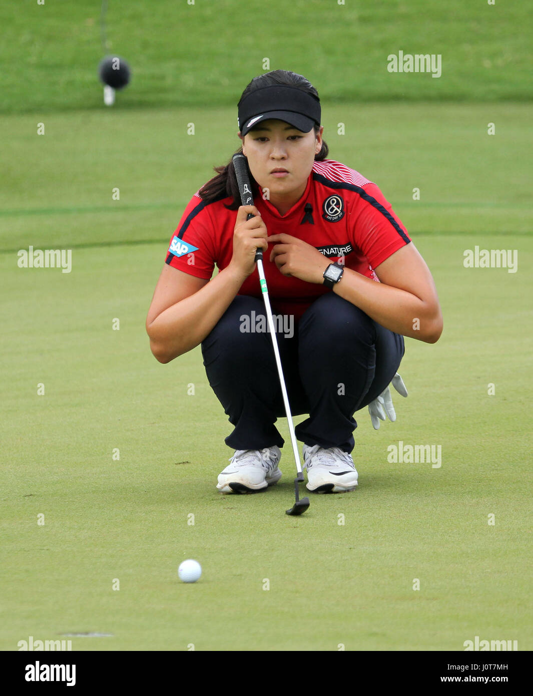 April 15, 2017 - In Gee Chun lines up her putt on the 13th hole during ...