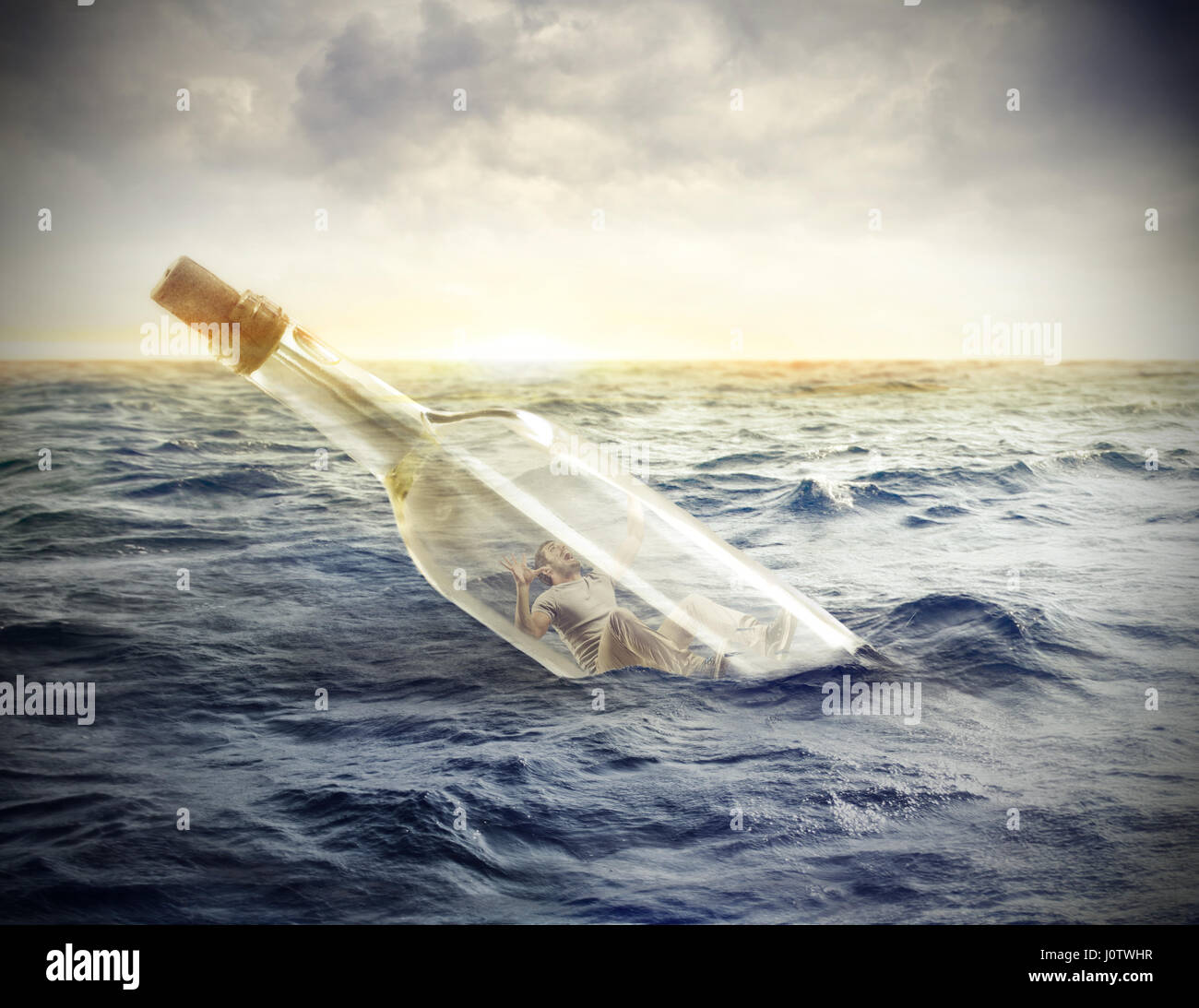 Bottle with letter in the sea Stock Photo - Alamy
