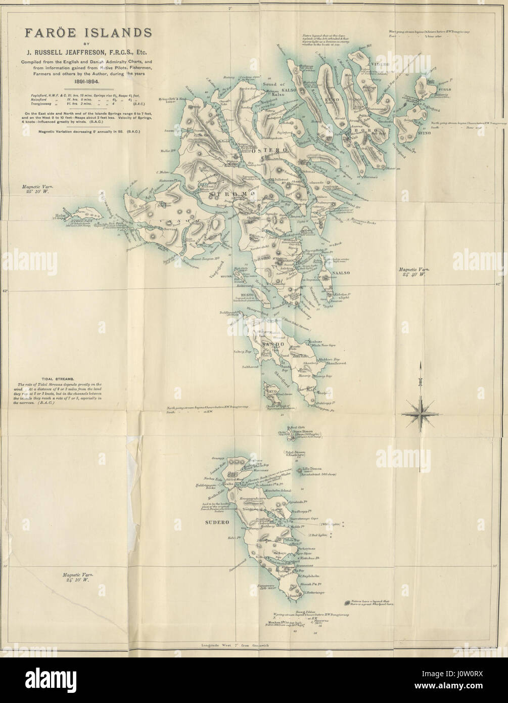 This image provides a glimpse into the Faroese Islands, featuring a ...