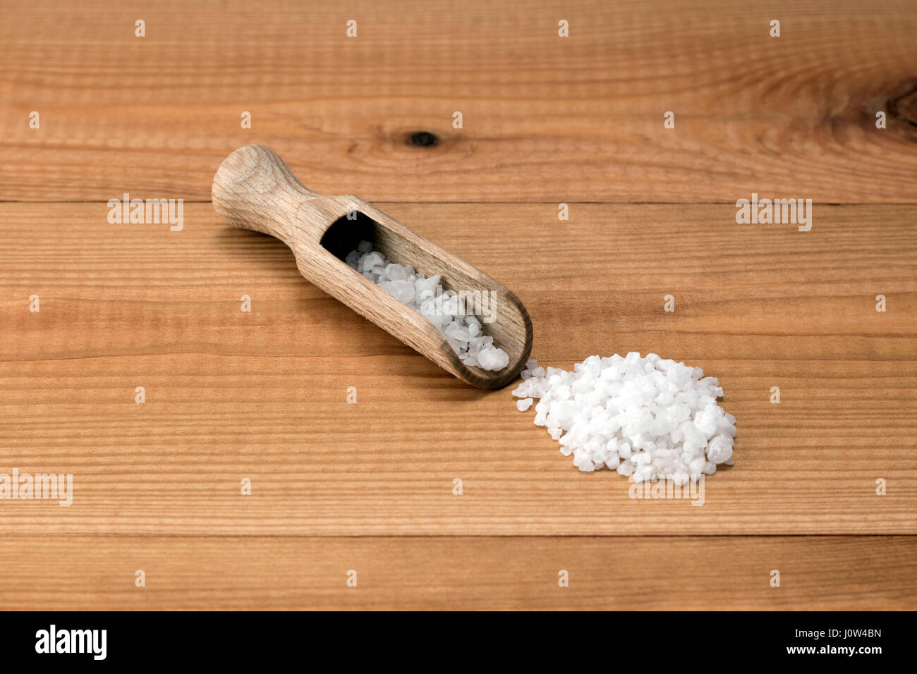 salt crystals with wooden spoon Stock Photo - Alamy