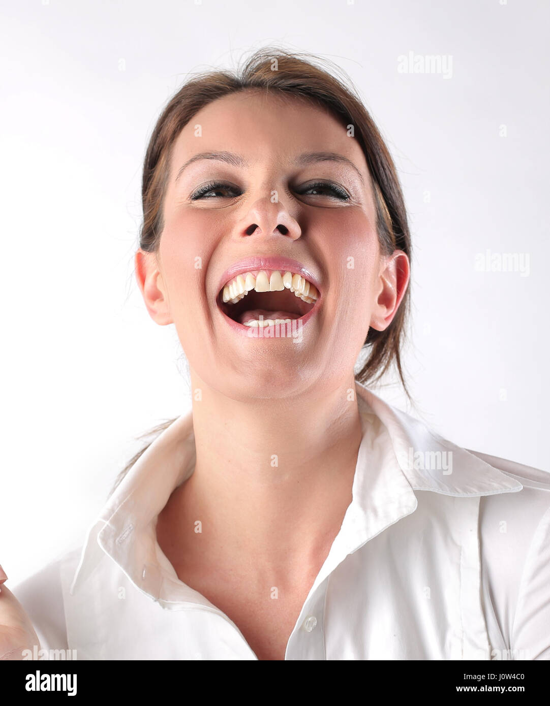 Woman laughing inside Stock Photo - Alamy