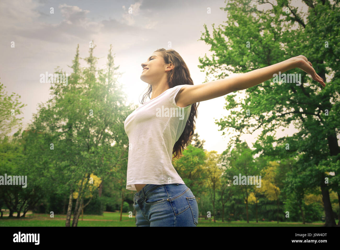 Beautiful teen feeling free in hi-res stock photography and images - Alamy