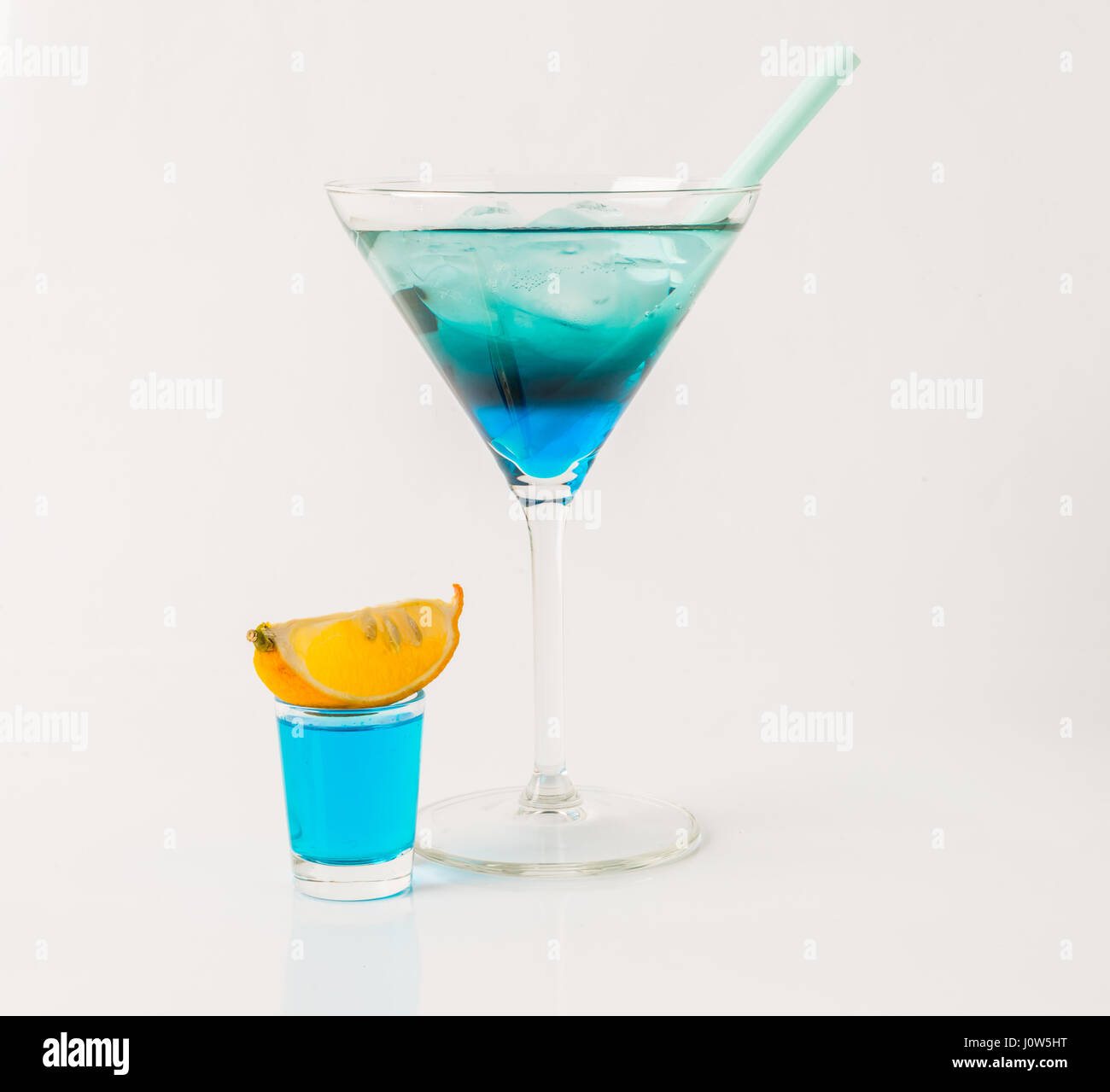 Colorful drink in a martini glass, blue and green combination, drink in ...