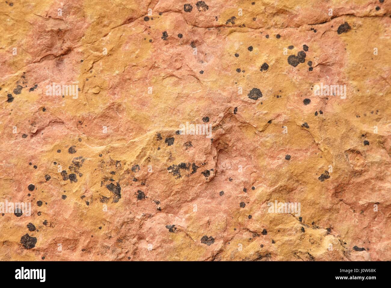 Beautiful old red stone wall texture background Stock Photo - Alamy