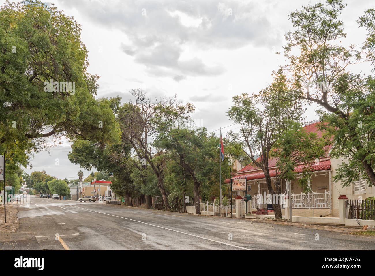 DE RUST, SOUTH AFRICA - MARCH 23, 2017: A street scene in De Rust, a ...