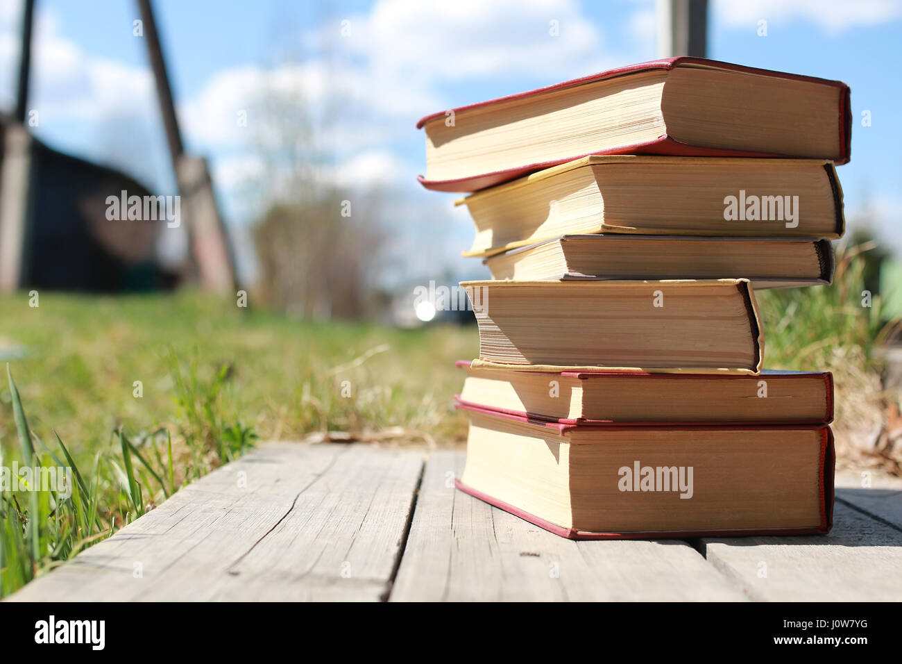 books standing on a table Stock Photo - Alamy