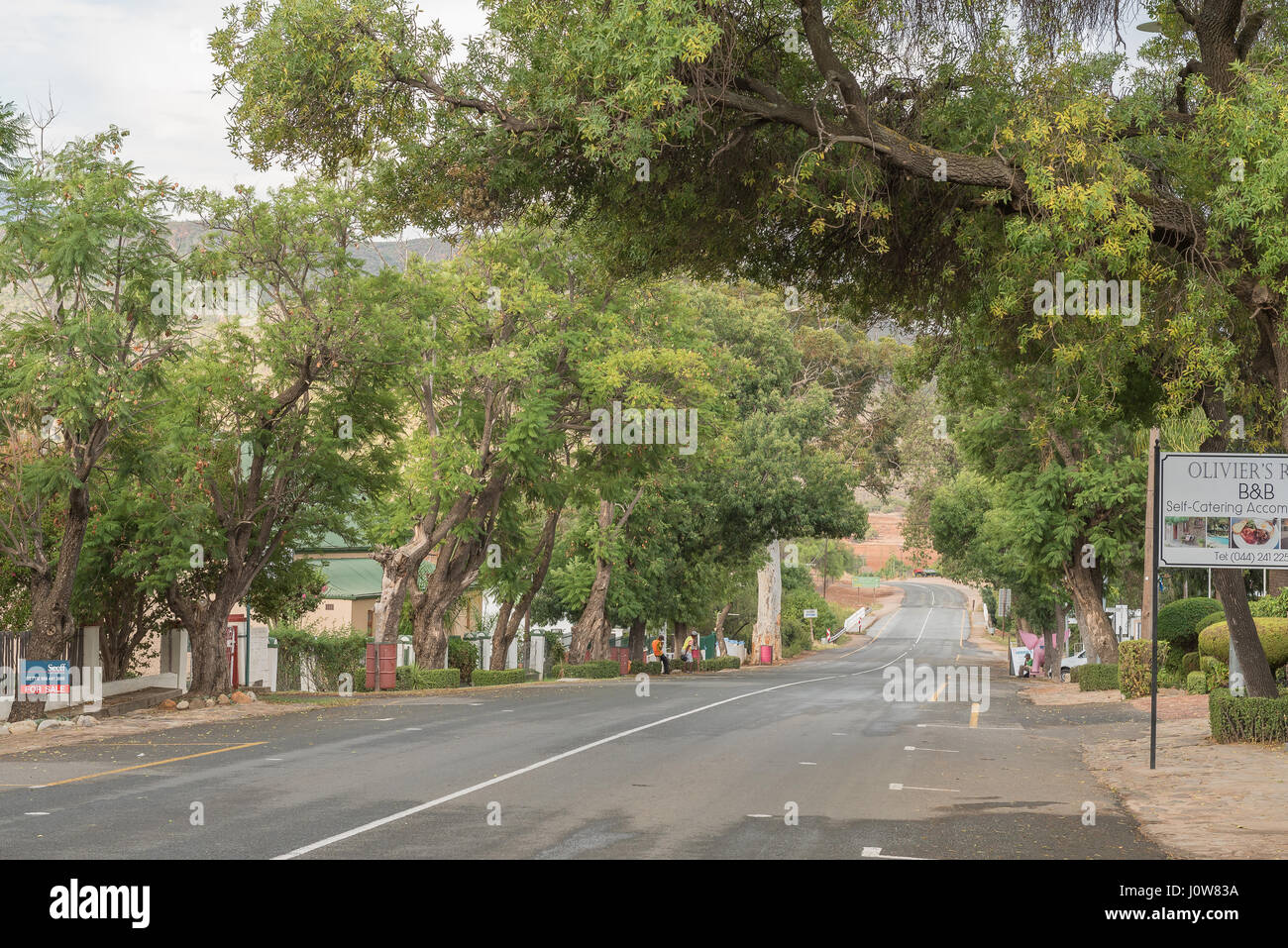 DE RUST, SOUTH AFRICA - MARCH 23, 2017: A street scene in De Rust, a ...