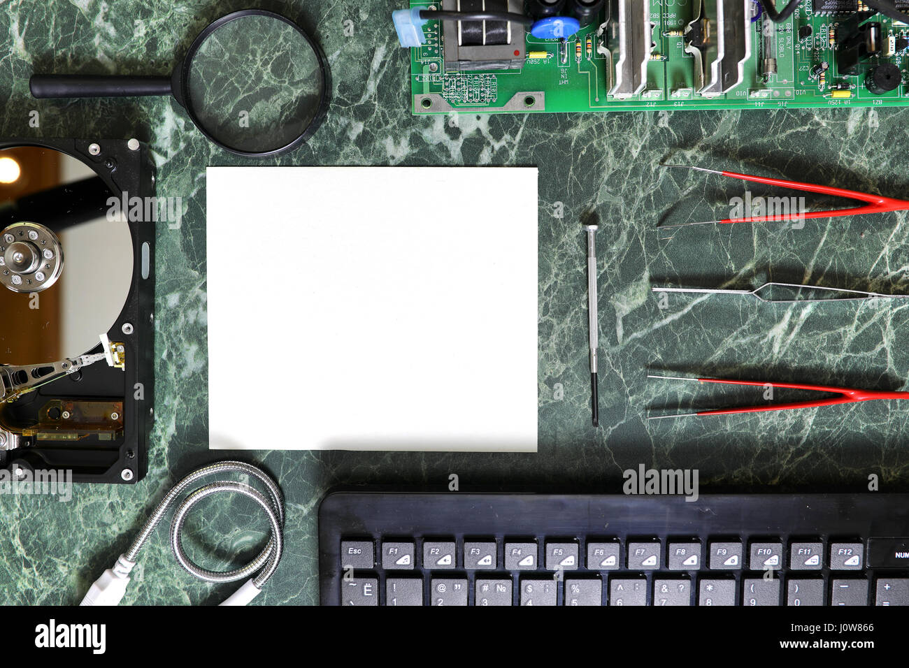 clean sheet of paper on desktop with tools Stock Photo - Alamy