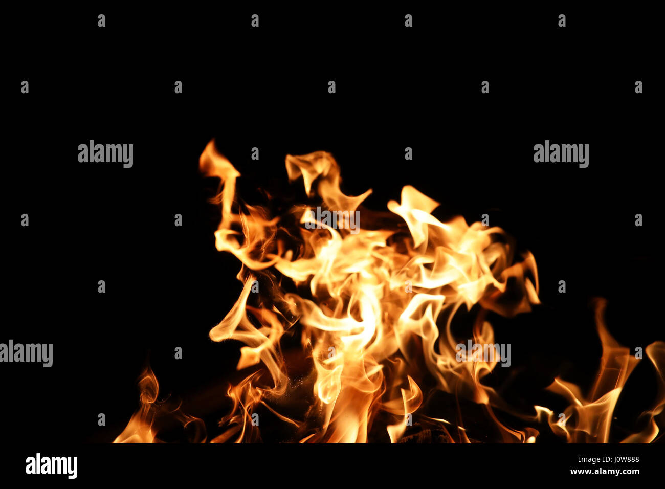Tongues of flame of fire of orange-yellow color from burning fir Stock ...