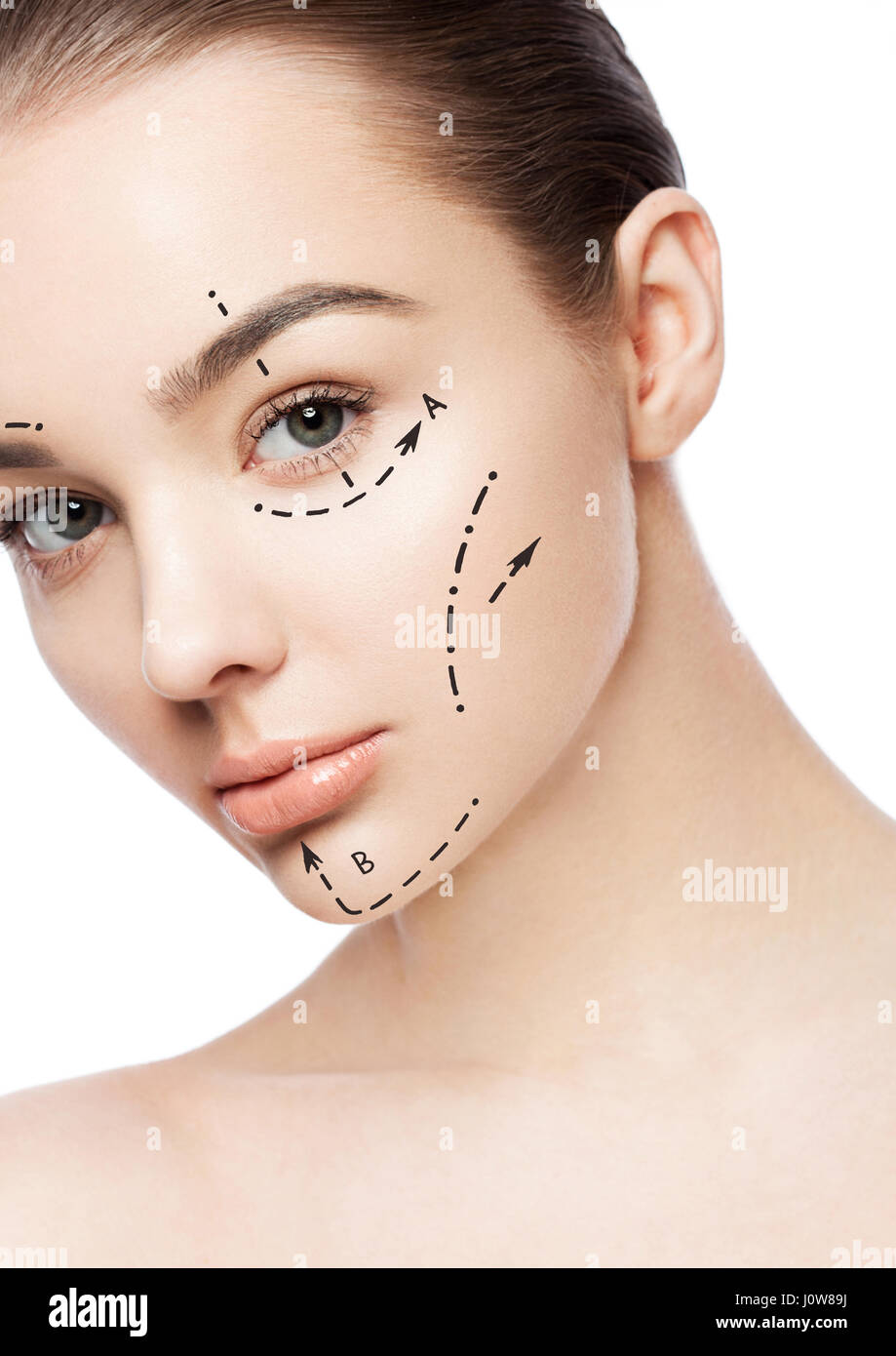 Beautiful girl face with plastic surgery stripes Stock Photo - Alamy