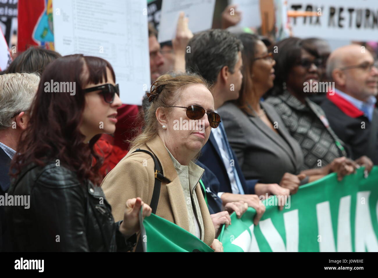 Actress Erin Darke holds banner with Manhattan borough president Gail ...