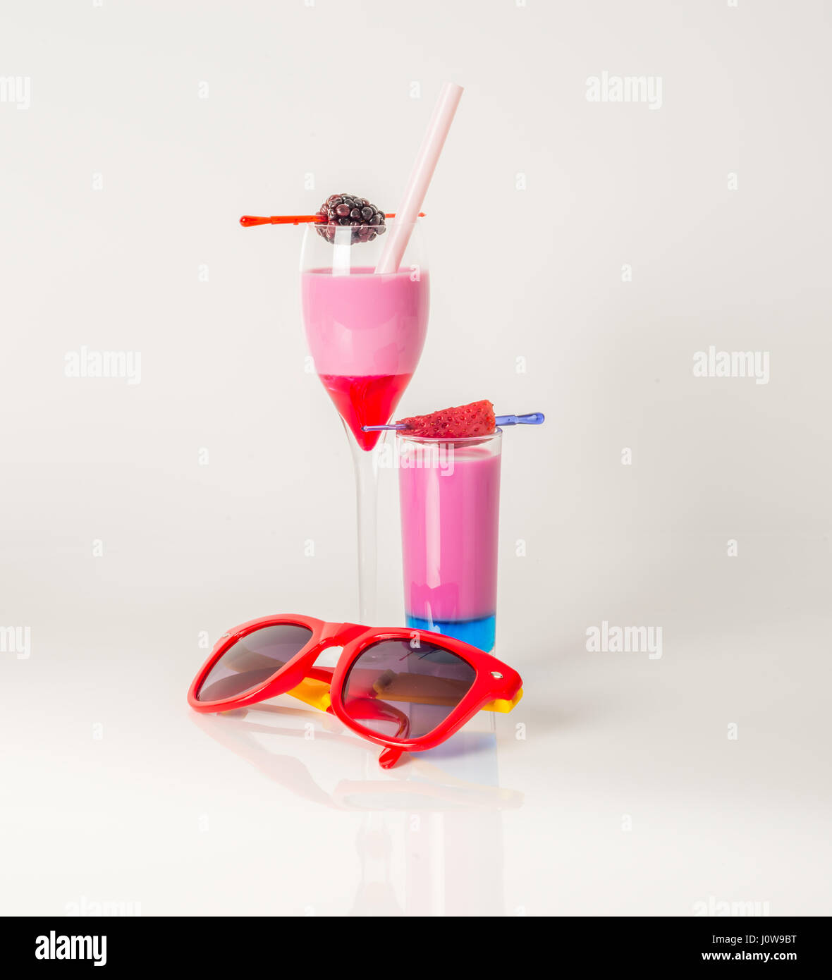 Colorful set of drinks, color drink decorated with fruit, sunglasses ...