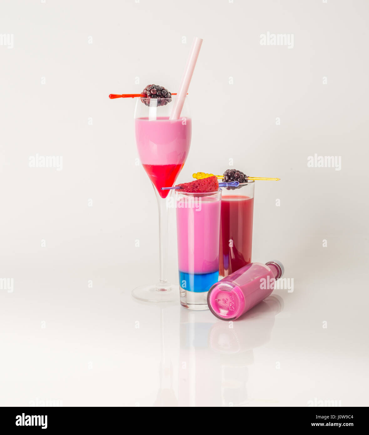 Colorful set of drinks, color drink decorated with fruit, sunglasses ...