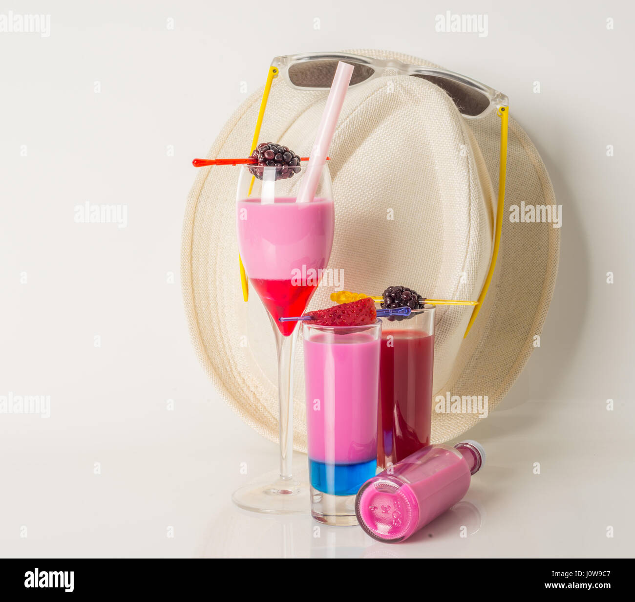 Colorful set of drinks, color drink decorated with fruit, sunglasses ...