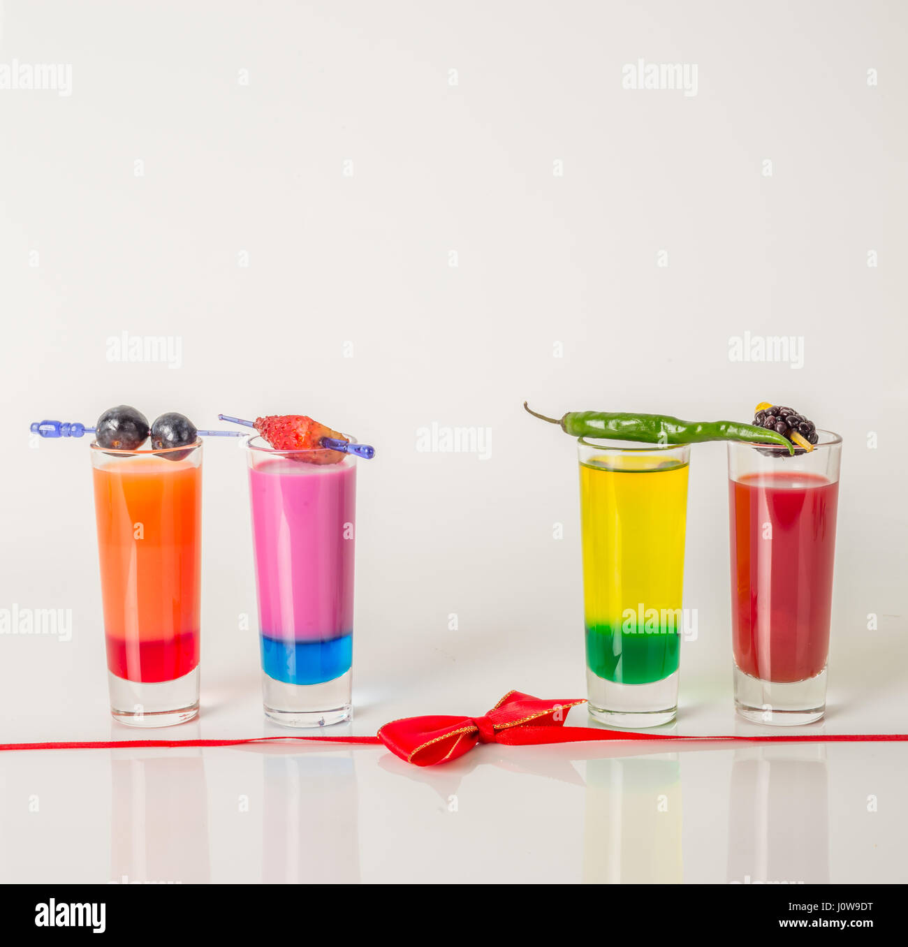 Colorful set of drinks, color drink decorated with fruit, color shots ...