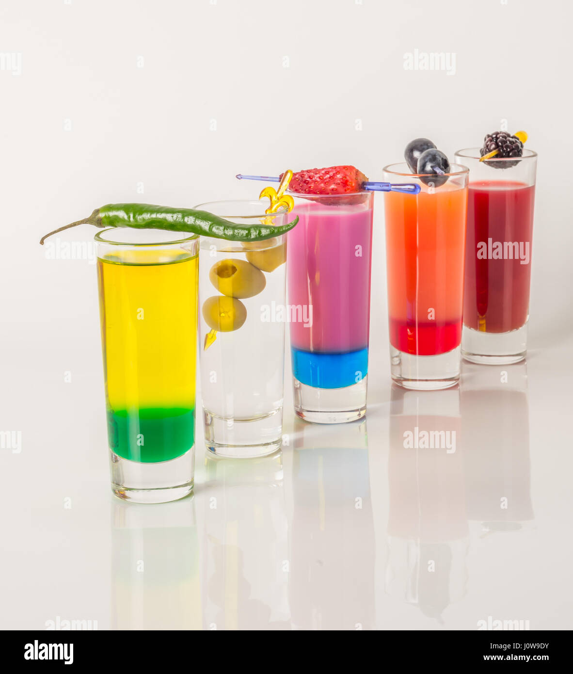 Colorful set of drinks, color drink decorated with fruit, color shots ...