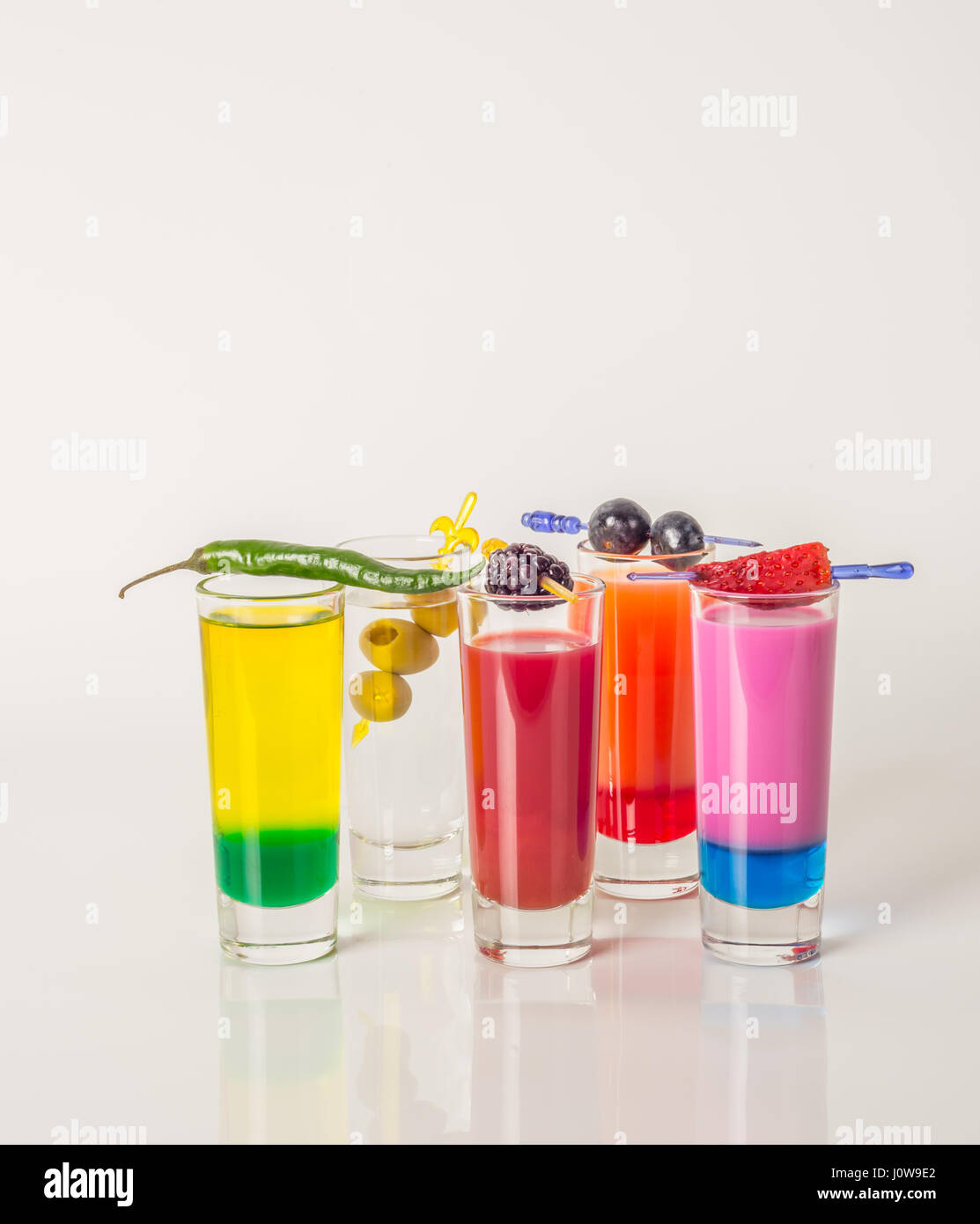 Colorful set of drinks, color drink decorated with fruit, color shots ...