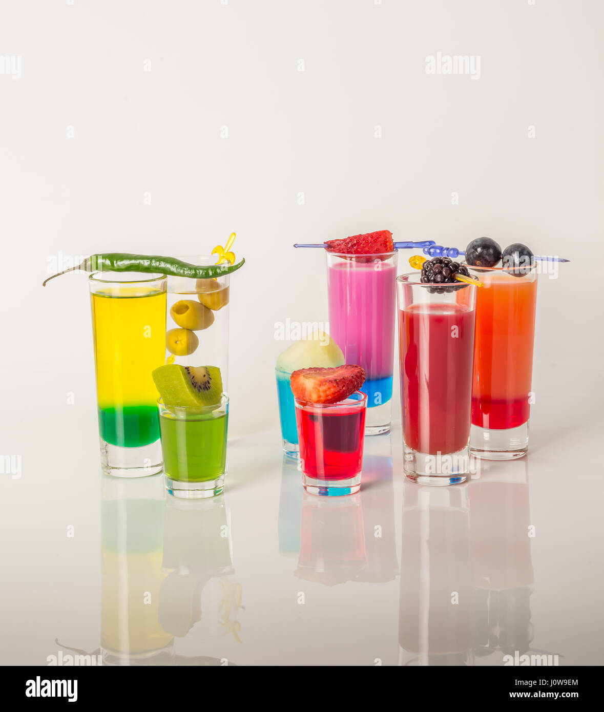 Colorful set of drinks, color drink decorated with fruit, color shots ...