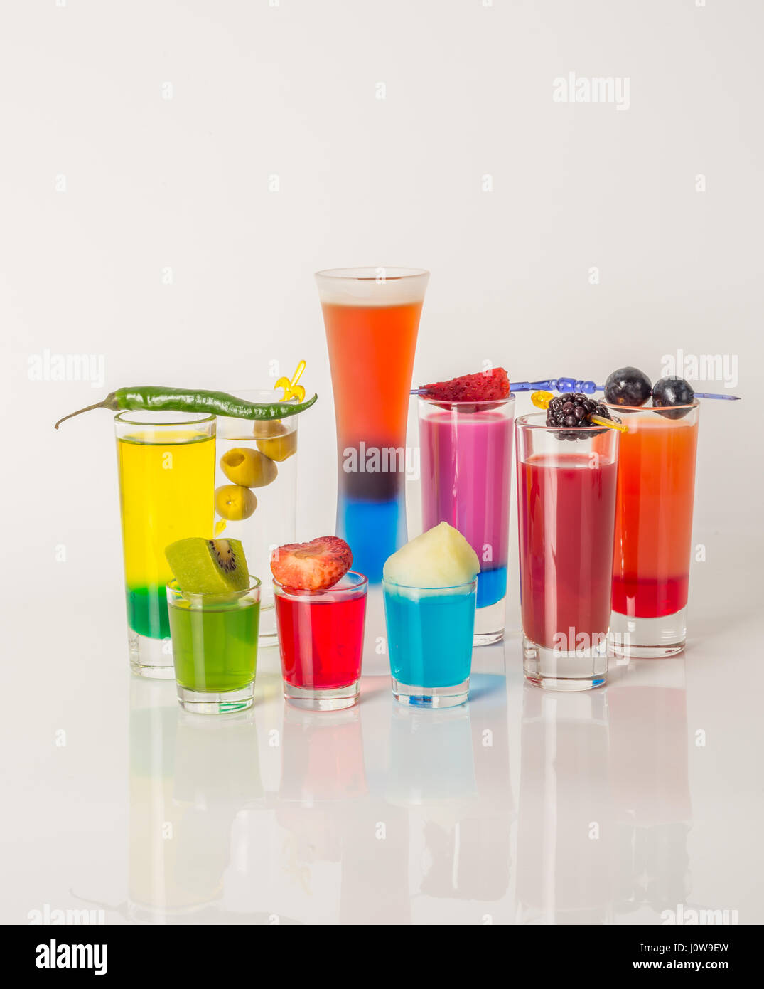 Colorful set of drinks, color drink decorated with fruit, color shots ...