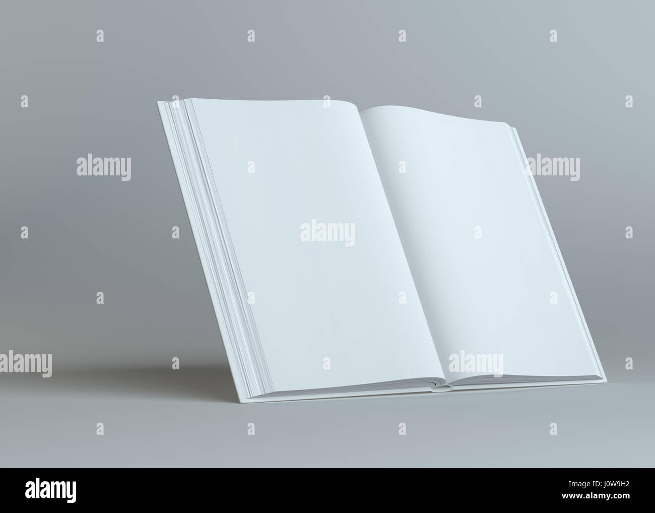 White empty open book on gray background Stock Photo - Alamy